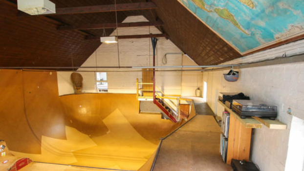 This house has a massive secret skatepark hidden inside, and it's for sale