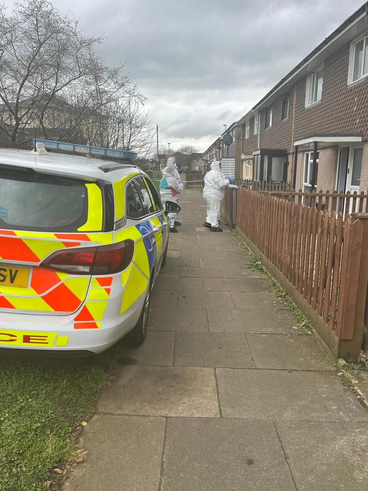 Mum's body found in suitcase inside wheelie bin behind her home three ...